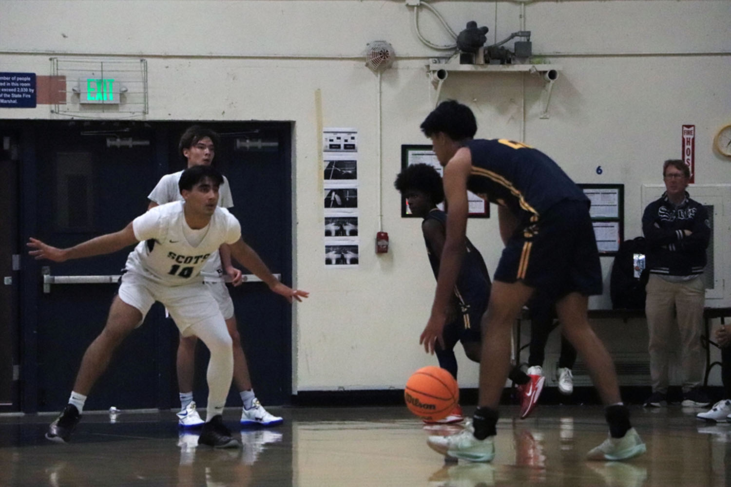 Scots fall short as Trojans infiltrate home court – Scot Scoop News